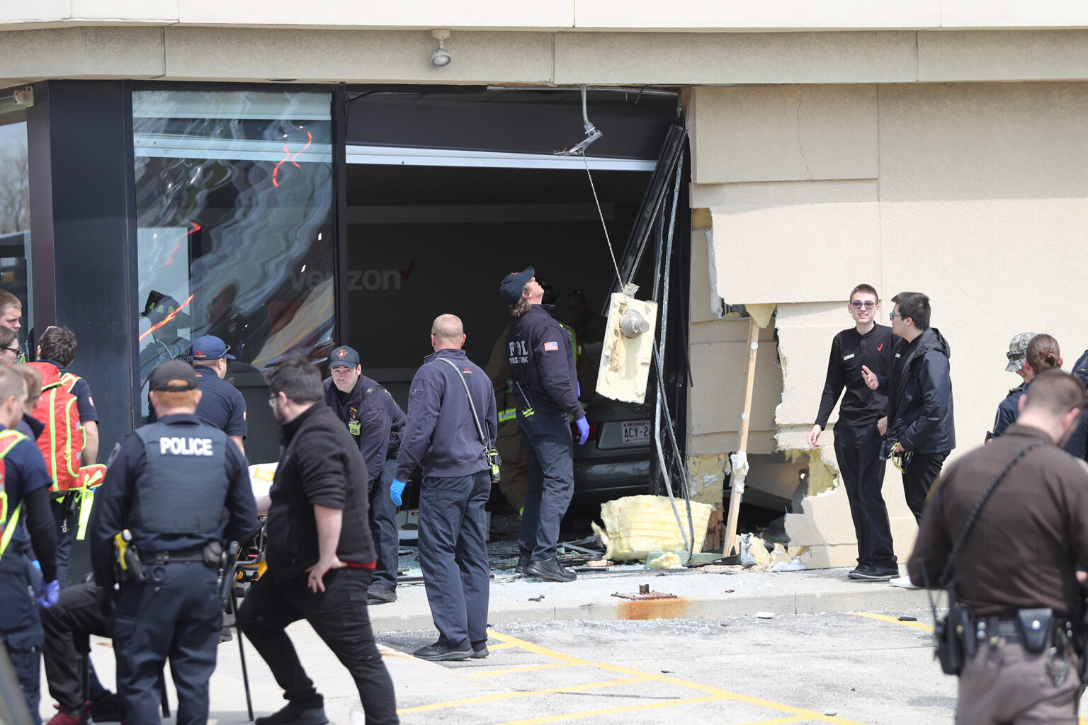 PHOTOS: 8 injured, 1 Critical At Car Vs Building Crash At Verizon Store ...