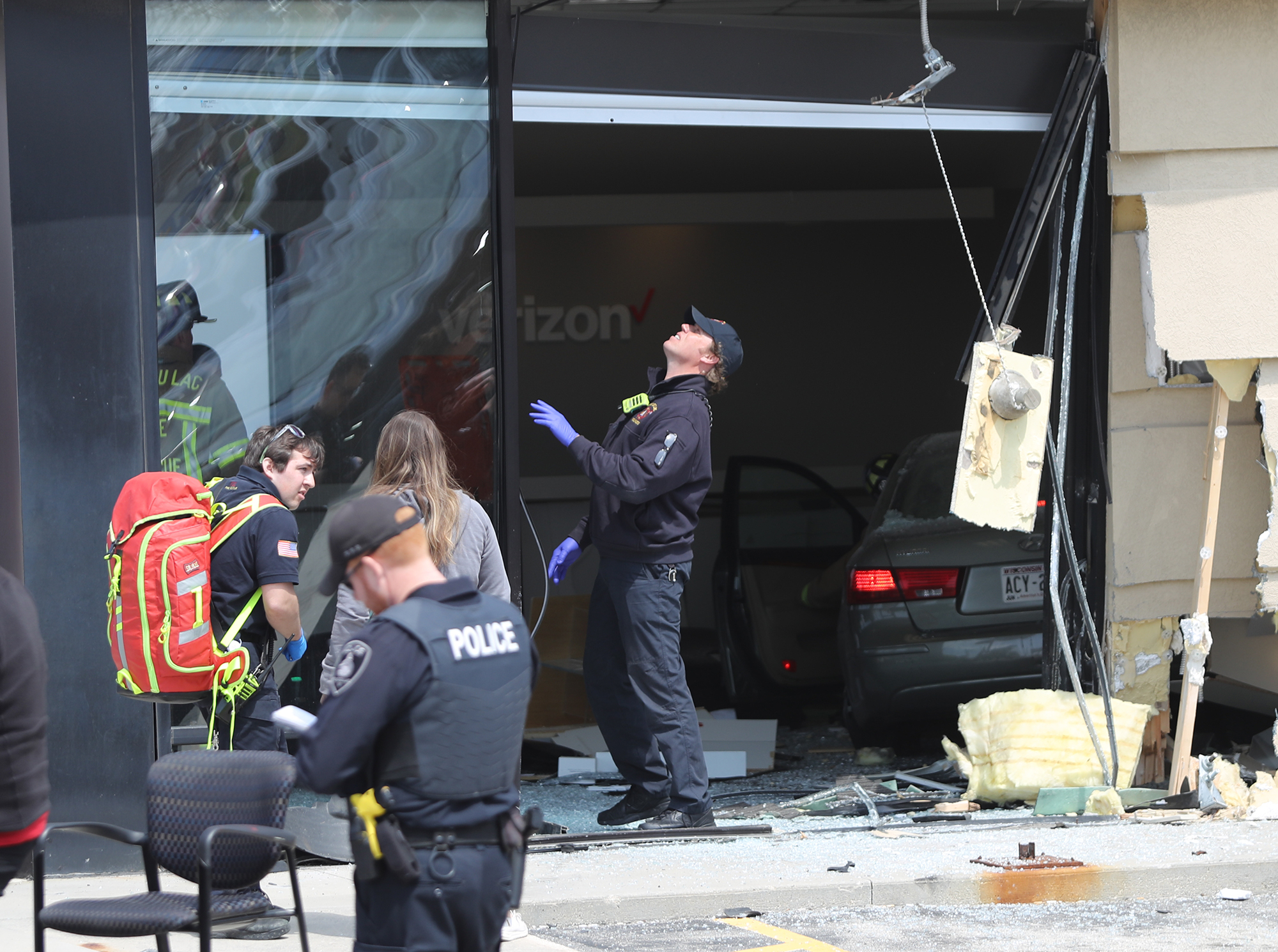 PHOTOS: 8 injured, 1 Critical At Car Vs Building Crash At Verizon Store ...