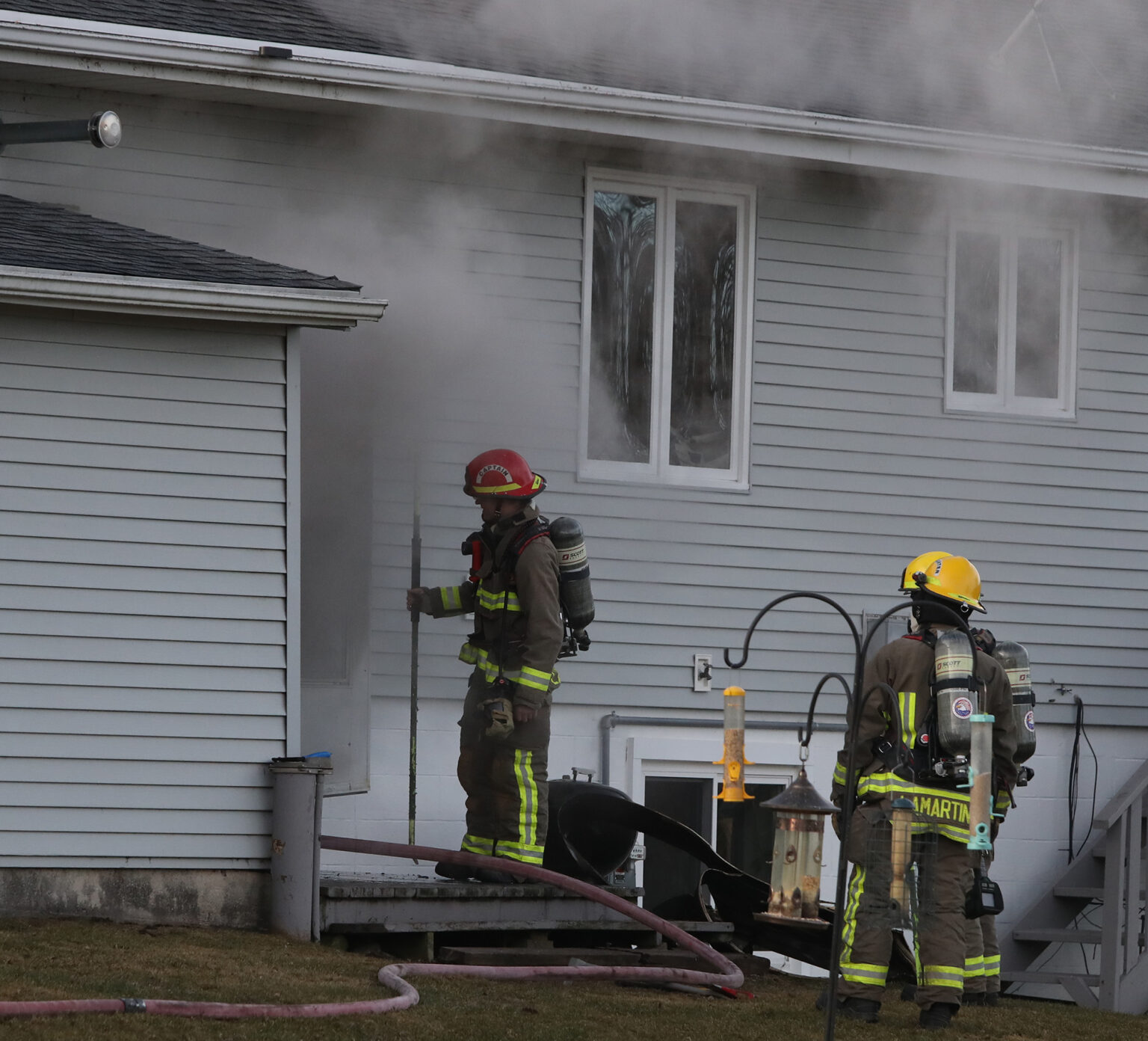 Local firefighters save house from attached garage fire on Highway 23 ...