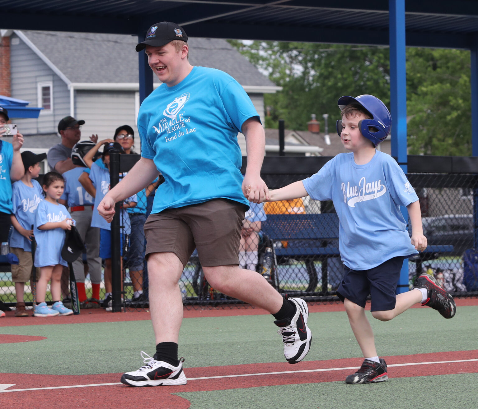 PHOTOS: Miracle League plays first game at Plamore Park in Fond du Lac ...