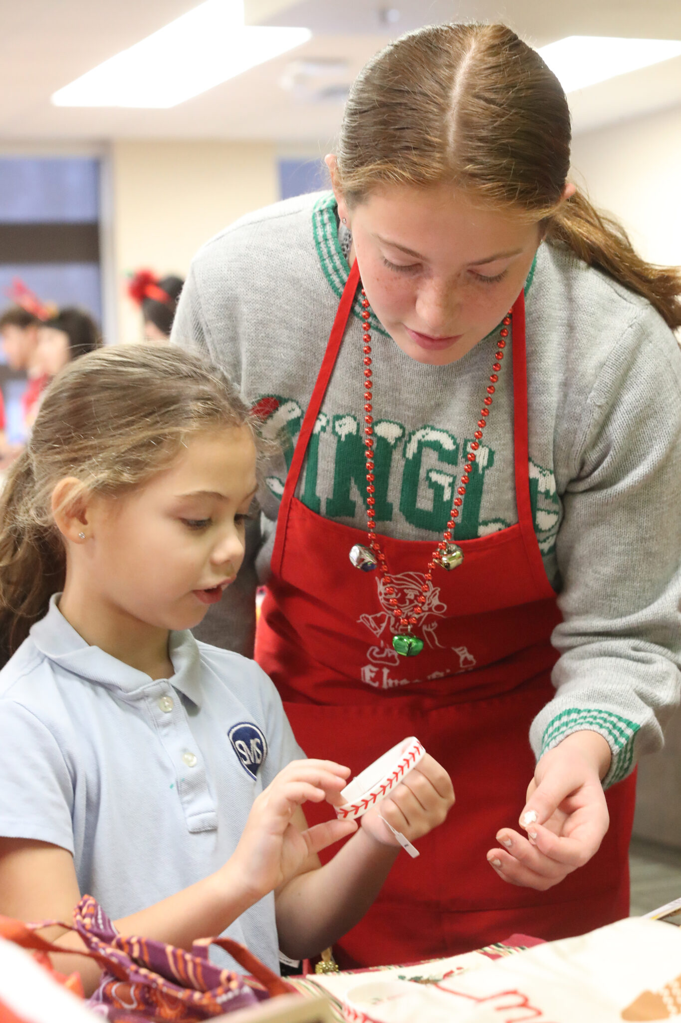 PHOTOS: St. Mary's Springs 8th grade "elves" help younger classmates ...