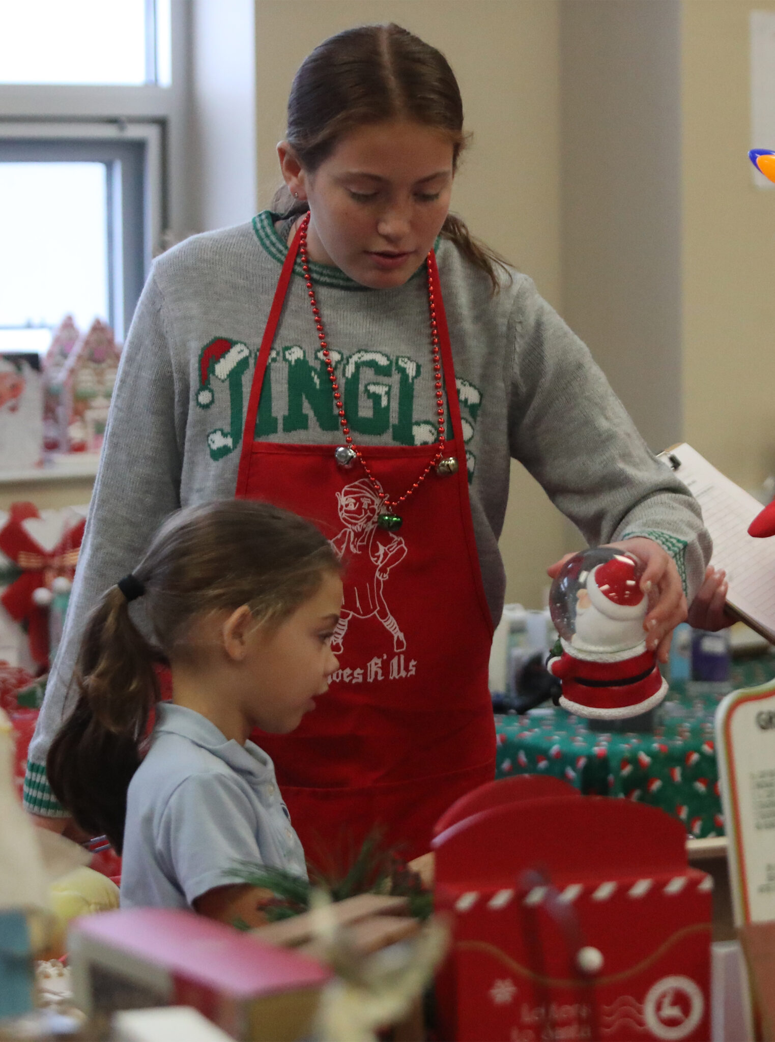 PHOTOS: St. Mary's Springs 8th grade "elves" help younger classmates ...